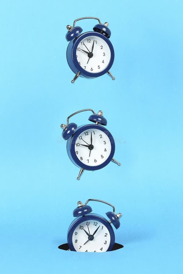Falling alarm clock stock photo. Image of pass, timer - 161973322