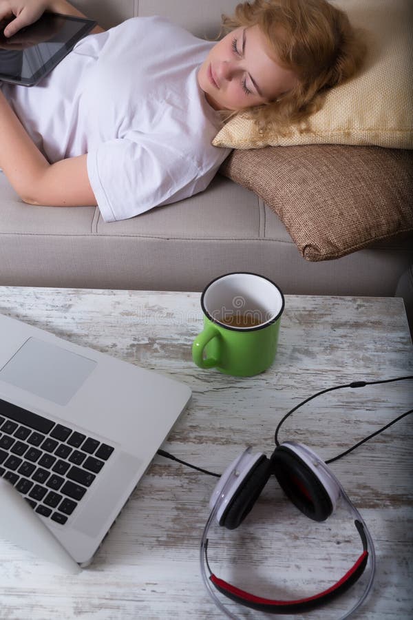 Falling Asleep on the Sofa at Night Stock Photo - Image of room ...