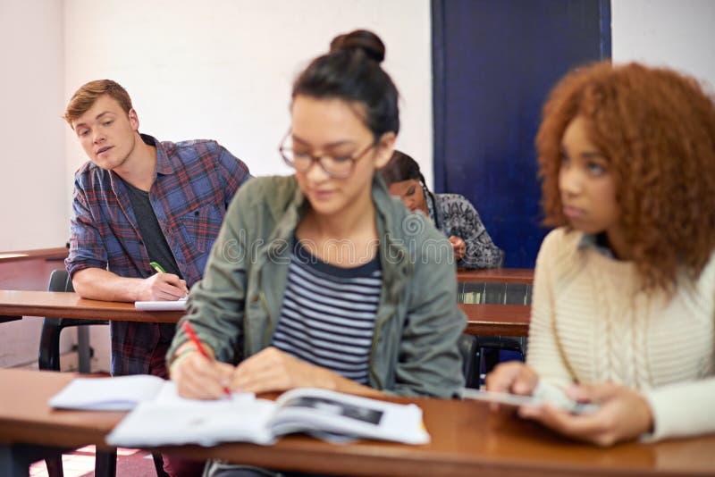 Falling Behind in Class. a Student Trying To See Another Students Work ...