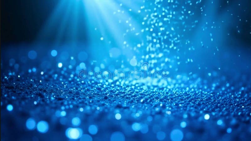 Blue Glitter Particles Falling in Light Rays Loop Stock Video - Video ...