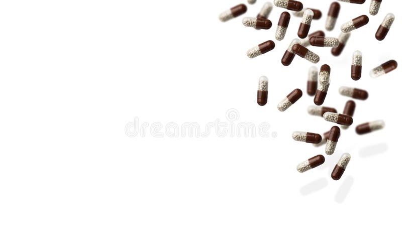 Falling Brown Medication Capsules Isolated on White Background Stock ...