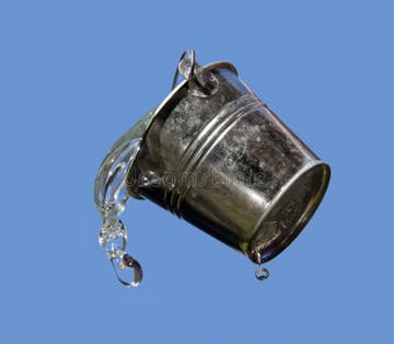 A Falling Buckets Splashes Water, on a Background of Blue Sky Stock ...