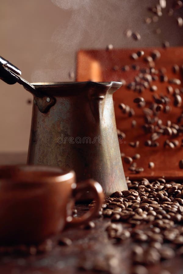Falling Coffee Beans and Old Copper Coffee Maker Stock Image - Image of ...