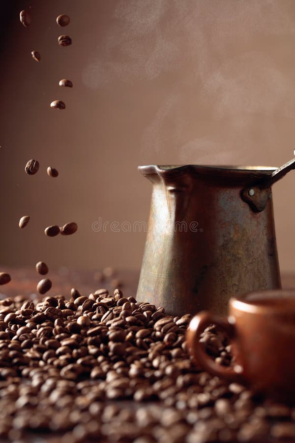 Falling Coffee Beans and Old Copper Coffee Maker Stock Photo - Image of ...