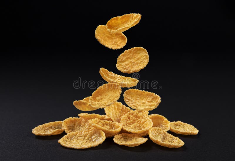 Falling Corn Flakes Isolated on Red Color Background, Full Depth of ...