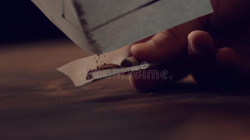 Falling of a Crushed Marijuana Falls on a Tissue Paper with Filter To ...