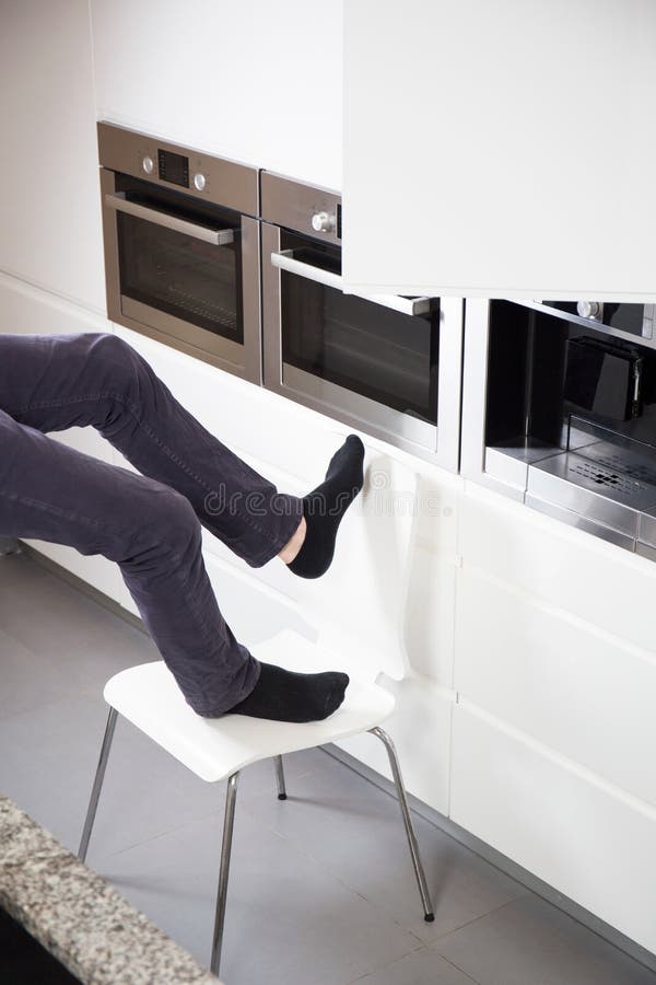 Falling Down from the Chair Stock Image - Image of kitchen, posture ...