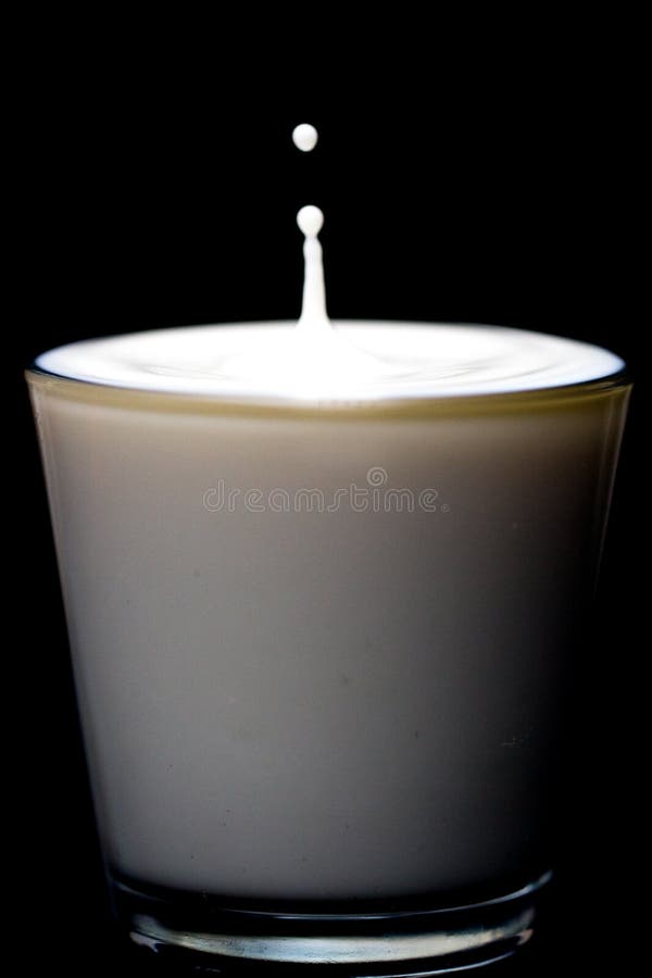 Falling Drop in a Full Milk Glass Stock Photo - Image of caffeine ...