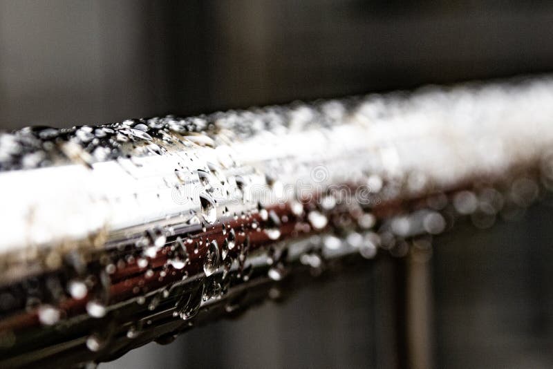 Falling Drop of Water in a Puddle Stock Photo - Image of puddle ...