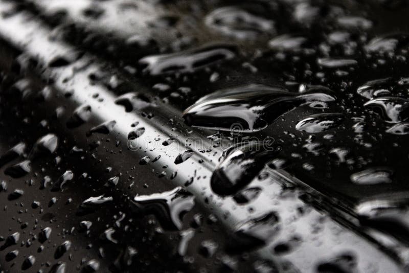 Falling Drop of Water in a Puddle Stock Image - Image of droplet ...