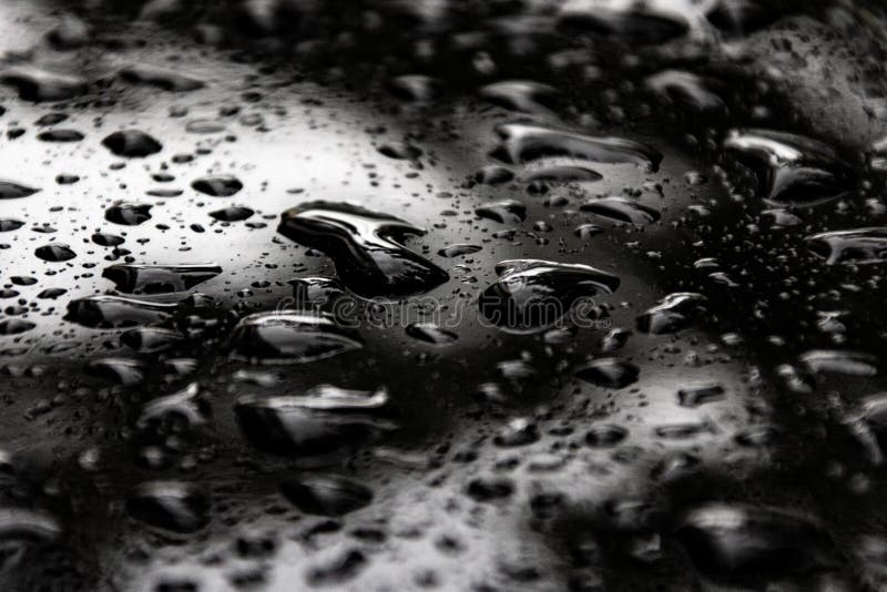 Falling Drop of Water in a Puddle Stock Photo - Image of green ...