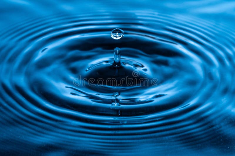 Falling Droplet of Water with Circular Waves Stock Image - Image of ...