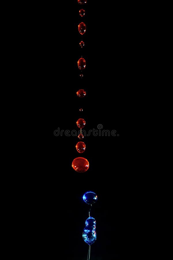 Falling Drops Colored Liquid Splashes Black Background Stock Photos ...