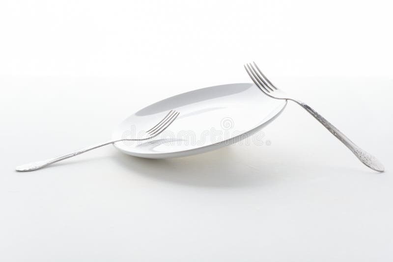 Falling Empty White Plate and Forks Stock Image - Image of lunch, view ...