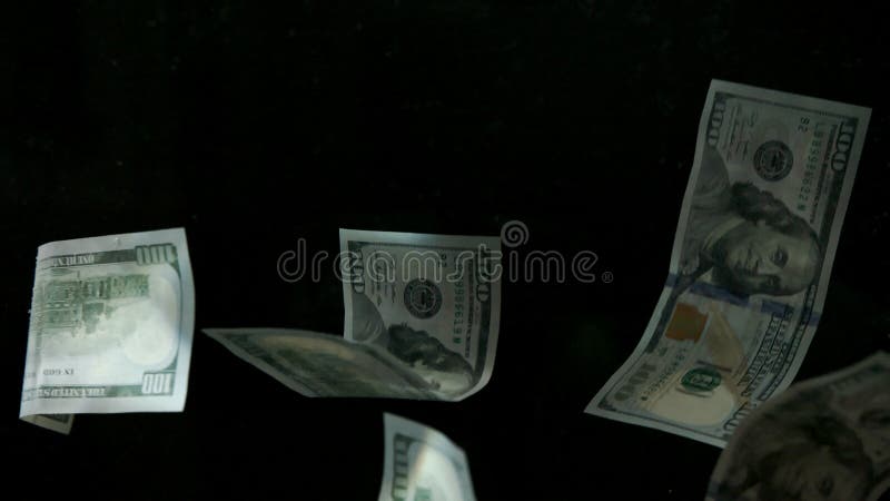 Falling Flying American Dollar Banknotes on a Black Background. Stock ...