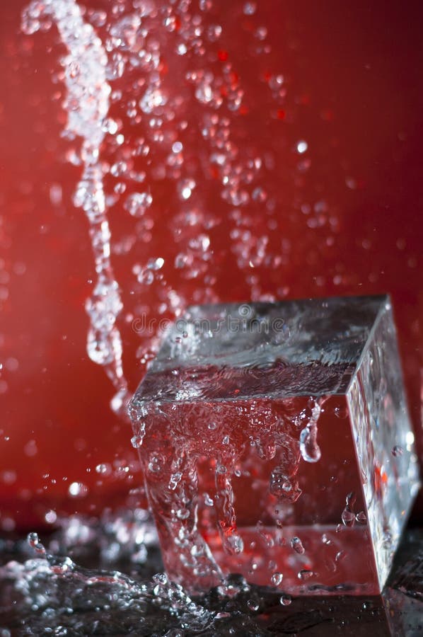 Falling Ice Cube and Water Splashes Stock Photo - Image of solid, water ...