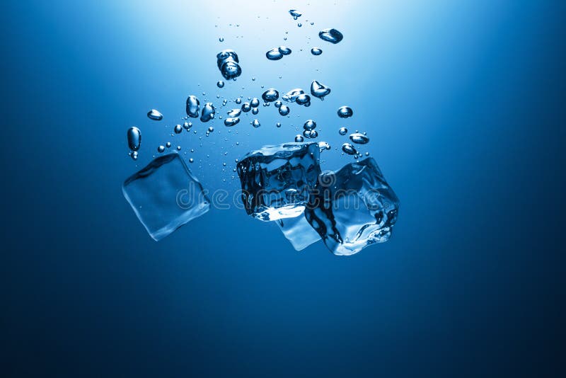 Falling ice cubes in water stock photo. Image of cube - 238527438