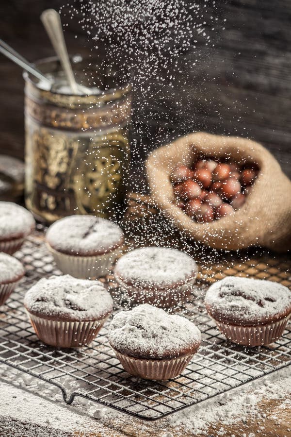 Falling Icing Sugar on Fresh Chocolate Muffins Stock Image - Image of ...