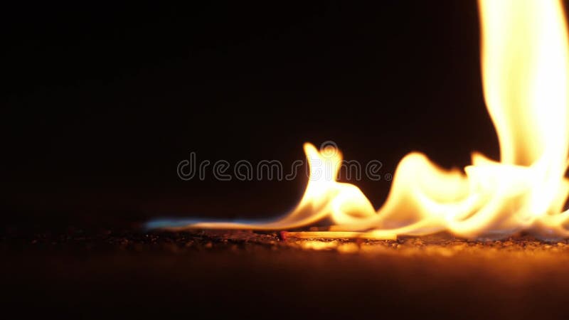 Falling of a Match in Petrol Puddle on a Gas Station. Showing a Risk of ...