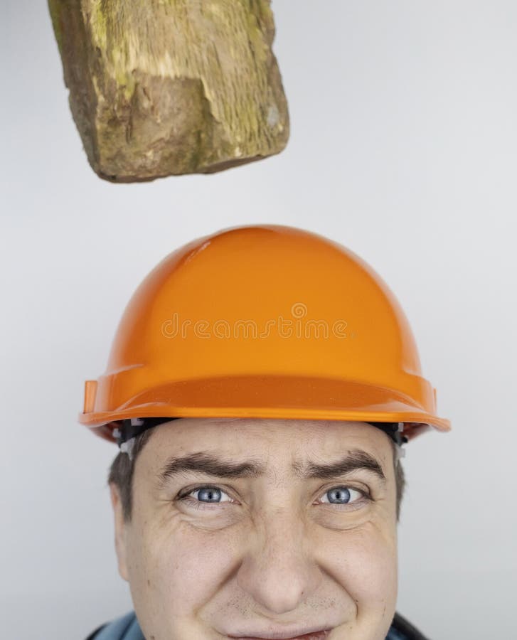 Safety Helmet. Brick and a Board Fall on Builder Head. Saving a Life ...