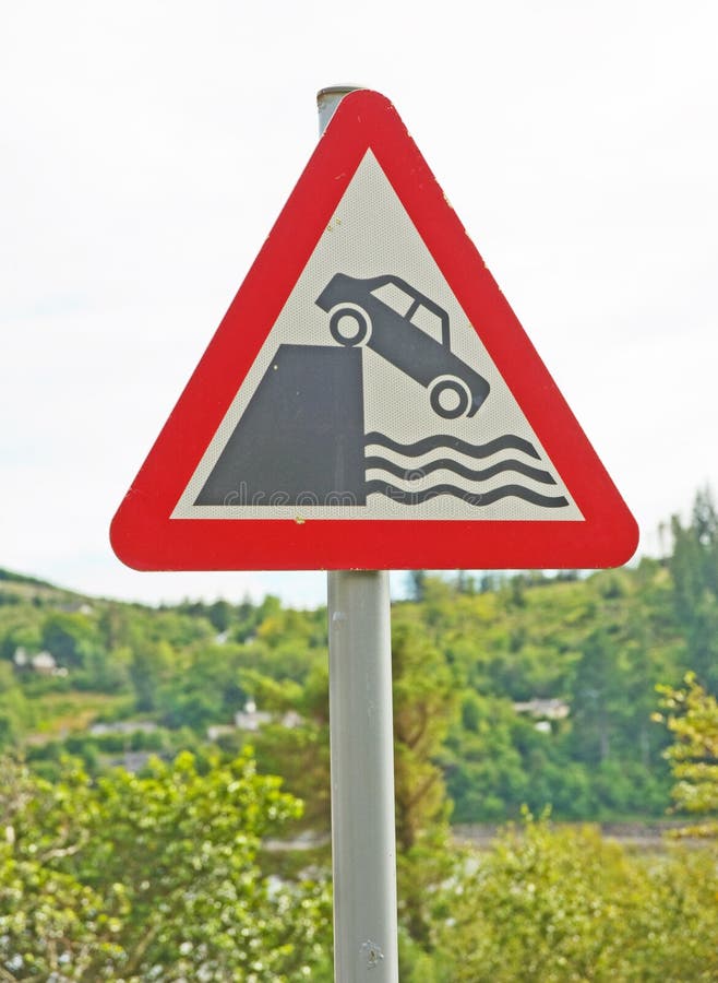 Falling Off a Cliff: Danger Sign. Stock Photo - Image of bushes ...