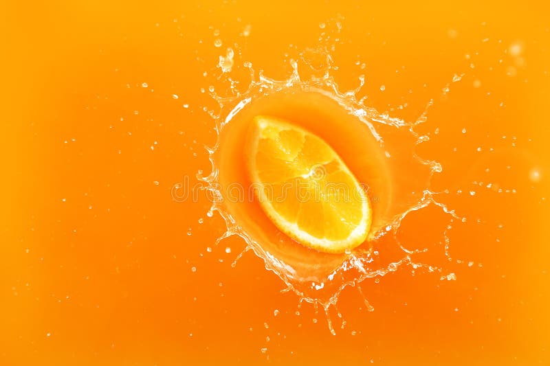 Falling of Orange Piece into Juice, Top View Stock Photo - Image of ...