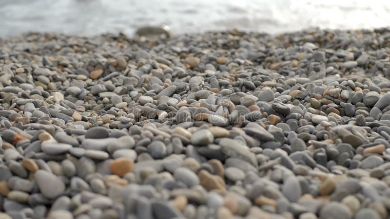 Falling Pebbles on the Background of the Sea Stock Video - Video of ...