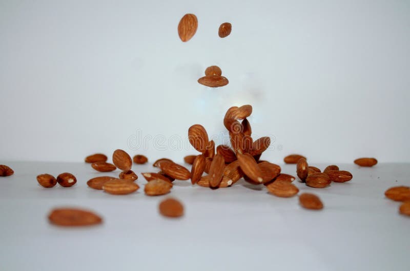 Falling Pile of Almonds stock photo. Image of nutrition - 101733322