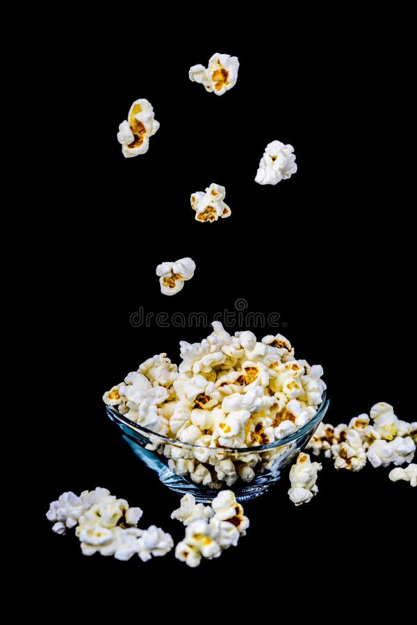 Falling Popcorn on Black Background. Levitating Popcorn Around a ...