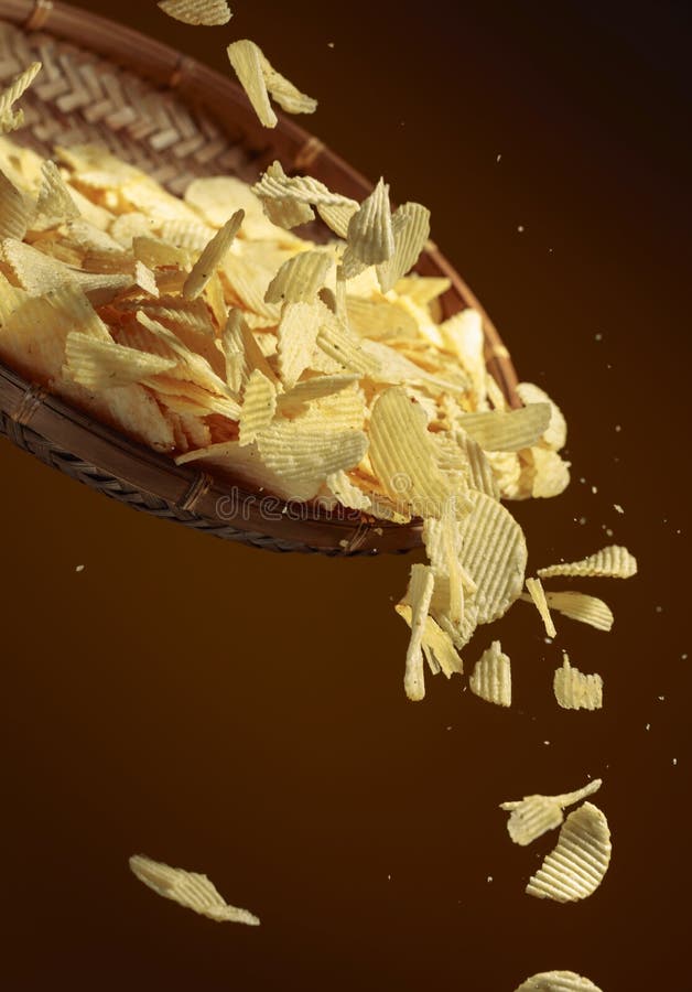 Falling Potato Chips on White Background, Levitation Concept Stock ...
