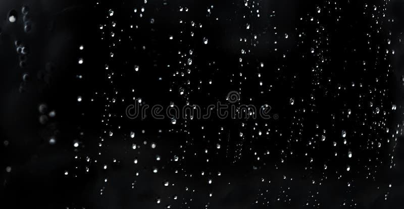 Rain Water Drops on a Black Dramatic Window Glass. Autumn Depression ...