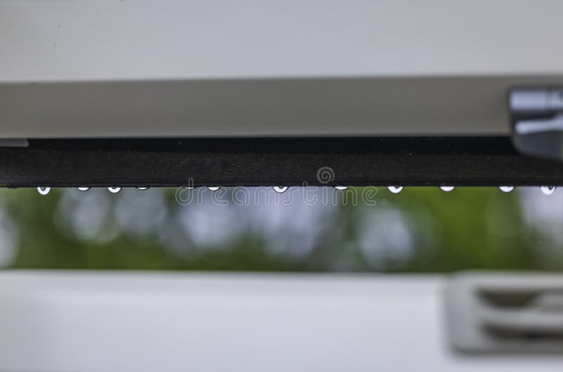 Falling Raindrops from Window Frame of Skylight during Rain. Stock ...