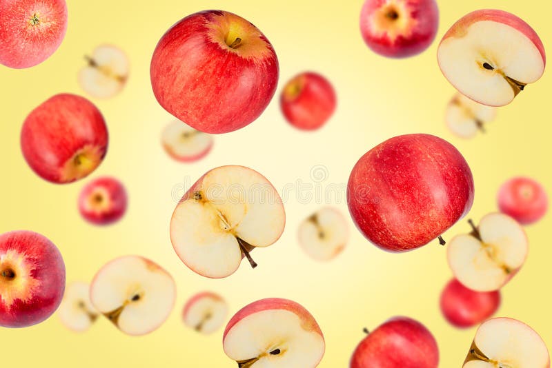 Falling Red Apples Isolated on a Yellow Background with Clipping Path ...