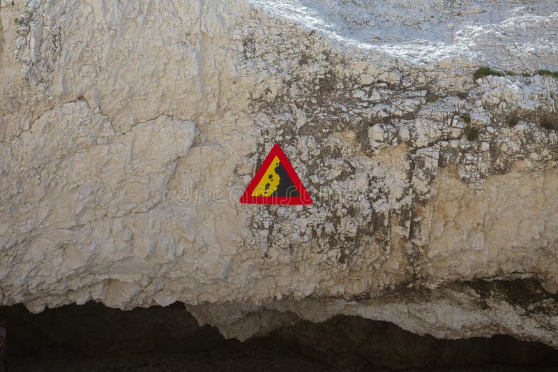 Falling Rocks Sign stock photo. Image of mountain, travel - 393946820