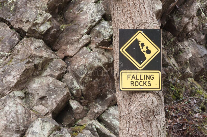 Falling Rocks Ahead Road Sign Stock Image - Image of safety, travel ...