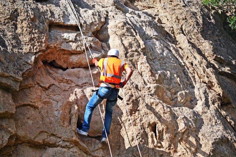 Falling by rope adventurer editorial stock image. Image of belts ...