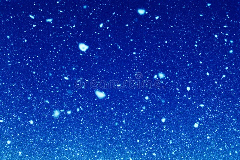 Falling Snow Flakes during the Snowfall from the Sky. Stock Image ...