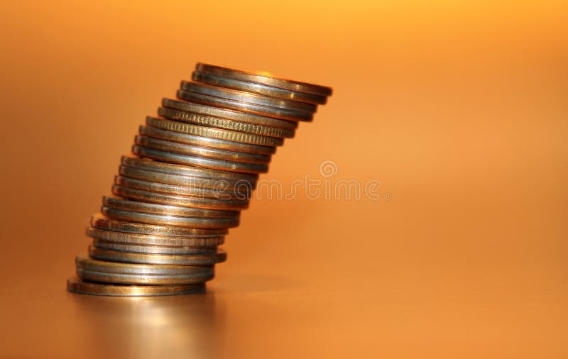 Falling Stack of Coins on a Golden Background Stock Photo - Image of ...