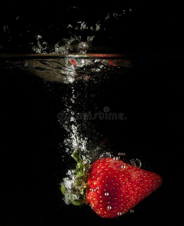 Falling strawberries stock photo. Image of spray, unit - 43165816