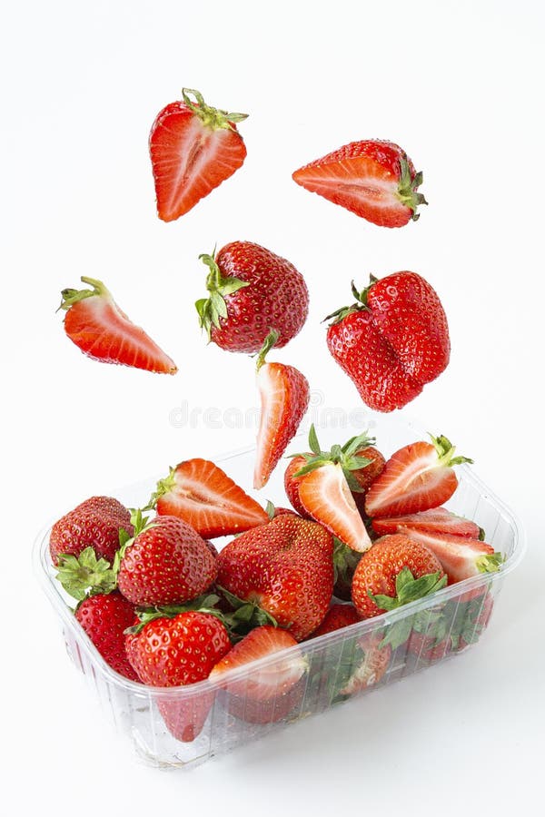 Falling Strawberries In A Transparent Plastic Package. Levitation ...