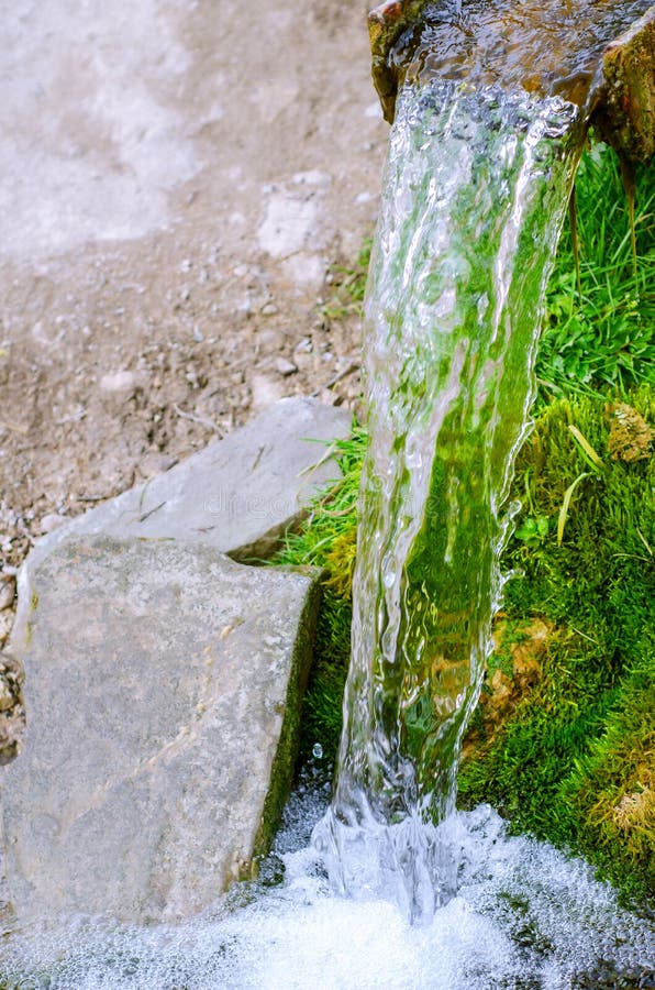 Falling Stream of Fresh Clean Spring Water. Energy of Nature Stock ...