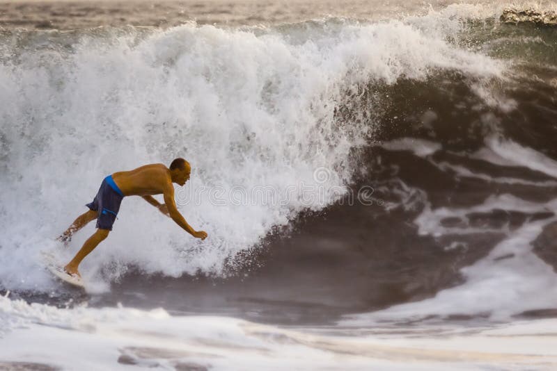 Falling Surfer on Blue Ocean Wave in Bali Stock Image - Image of barrel ...