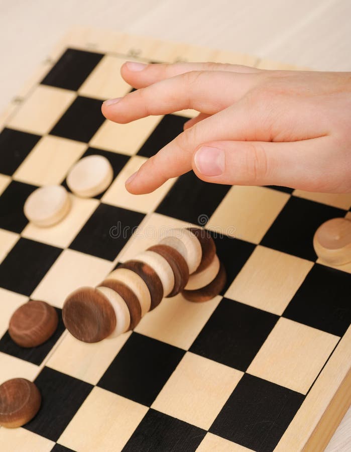 Falling Tower of Drafts on a Chess Field Stock Photo - Image of ...