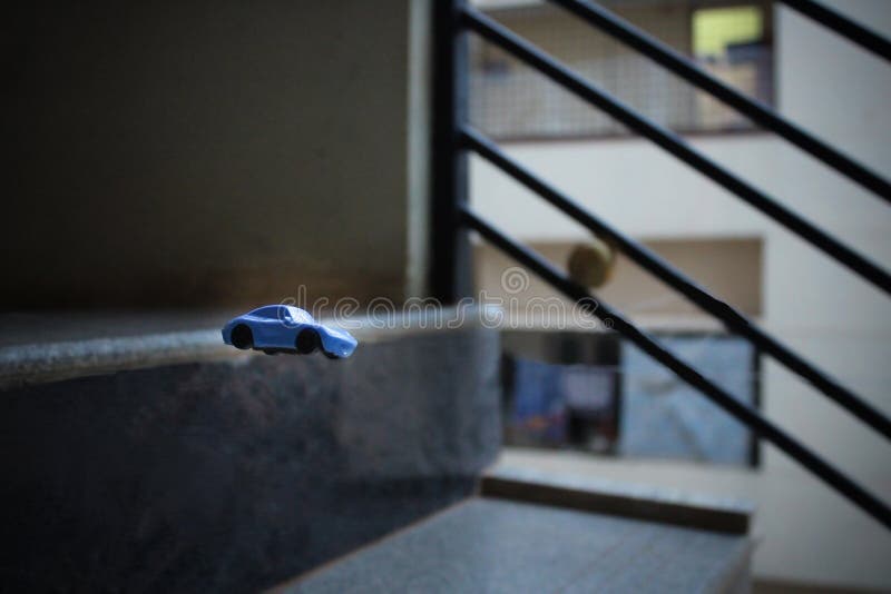 Falling toy car stock photo. Image of entrance, design - 194500738
