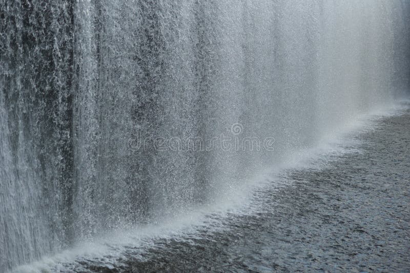 Falling water in a dam stock image. Image of stream - 159717483