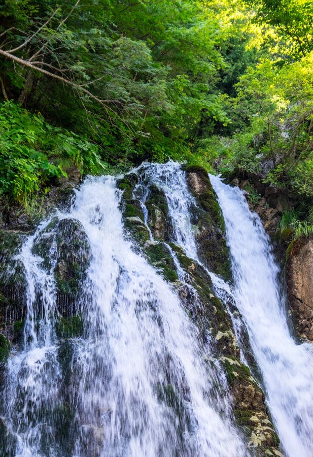 Falling water stock image. Image of splash, spring, waterfall - 83556523
