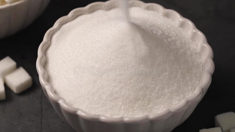 Falling White Sugar Granules into a Bowl Stock Footage - Video of ...