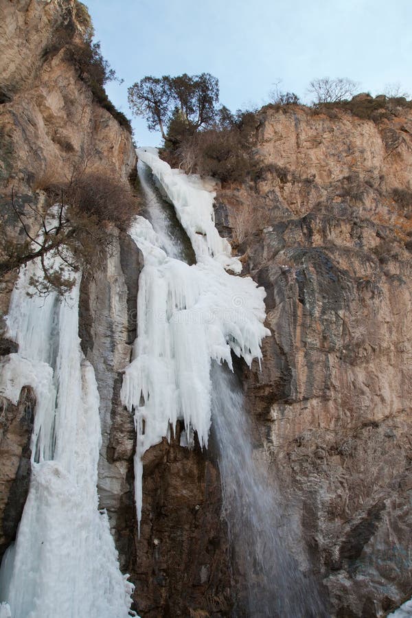 Falls in the Snow in the Spring. Stock Image - Image of vertical, ridge ...