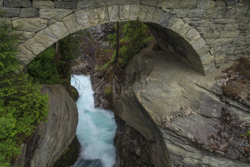 Falls Under the Beautiful Stone Bridge Stock Photo - Image of falls ...
