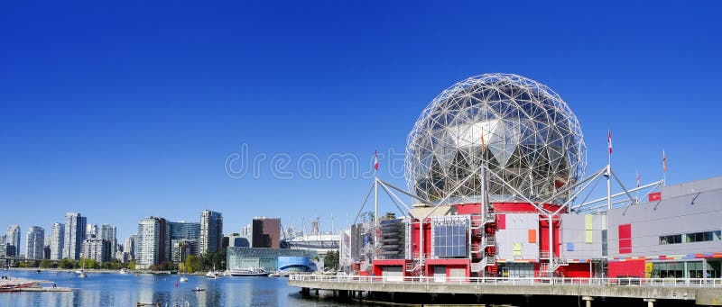 False Creek Science Center Building on Sunny Day Reflection in Water ...